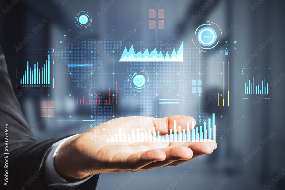 Close up of man hand holding glowing digital business interface with ...