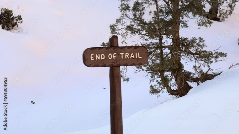 End of trail sign in Bryce Canyon National Park in winter with snow in ...