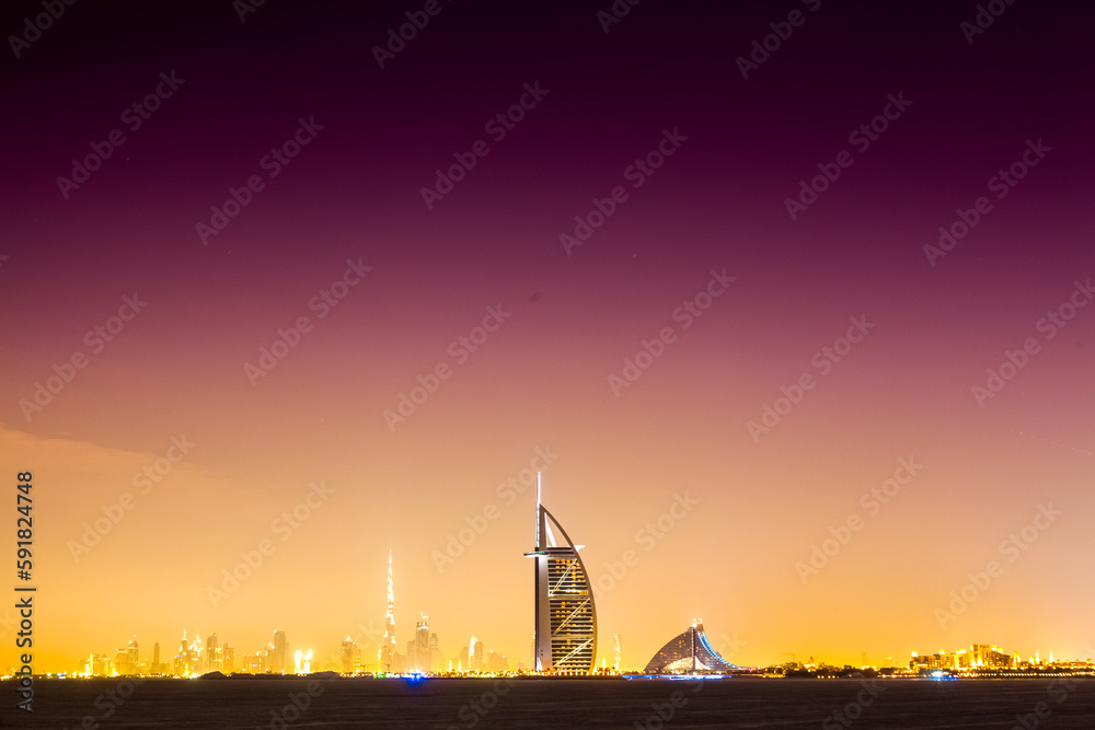 Burj Al Arab luxurious hotel - Dubai skyscrapers view. Modern arab city ...