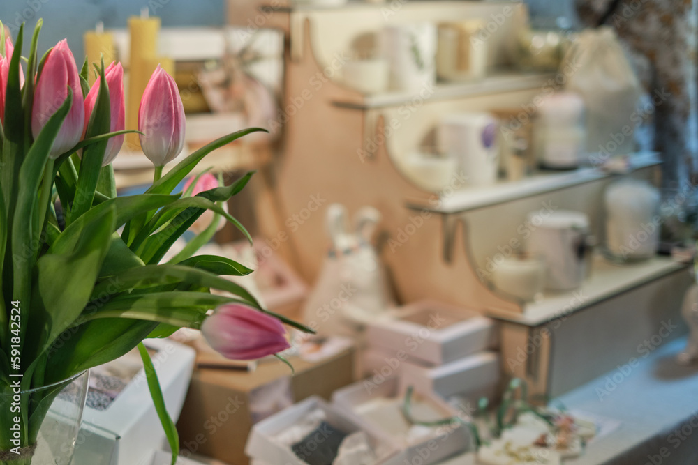 blurred backdrop of a beautiful market stall filled with handcrafted ...
