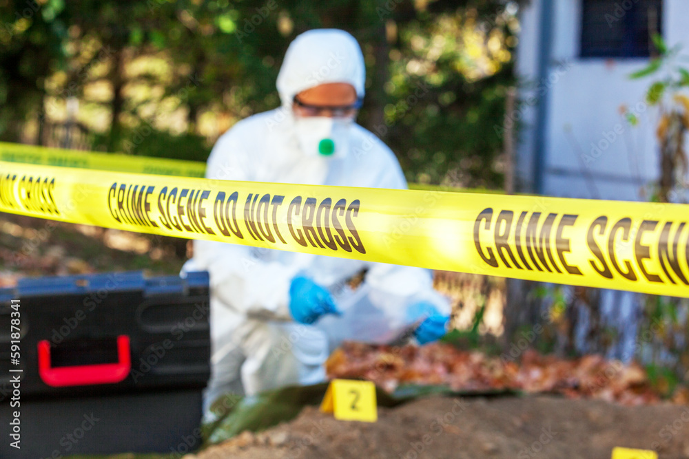 Crime scene investigation. Forensic science specialist working on human ...