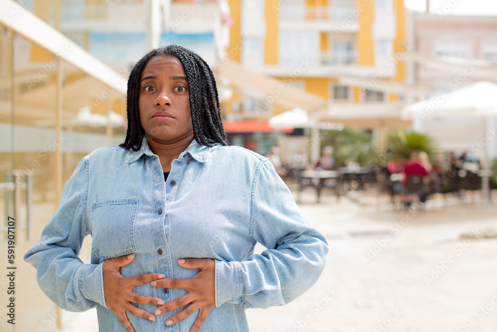 afro pretty black woman with a goofy, crazy, surprised expression ...
