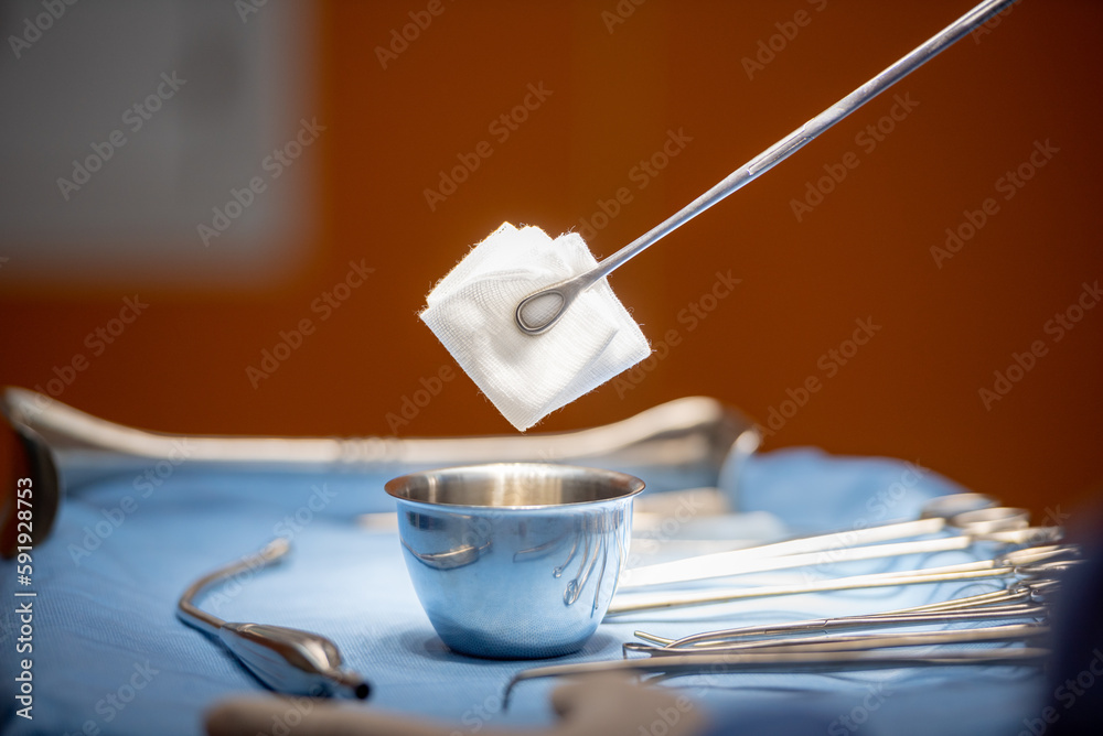 Hand of surgery doctor in Operating Room hold operating plier forceps ...