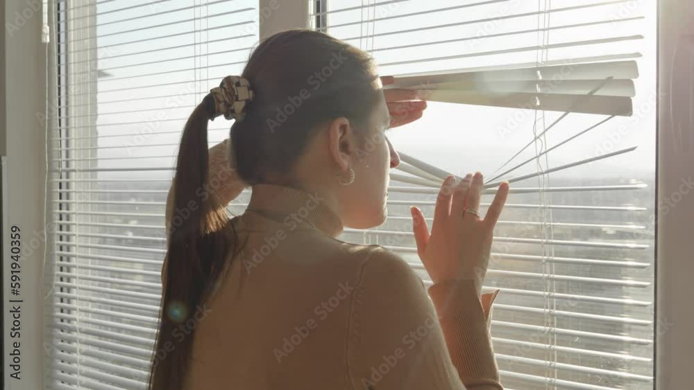 Young woman got scared and terrified after looking through window ...