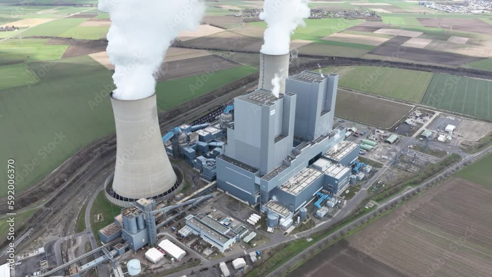An impressive drone video of a massive industrial power plant with ...