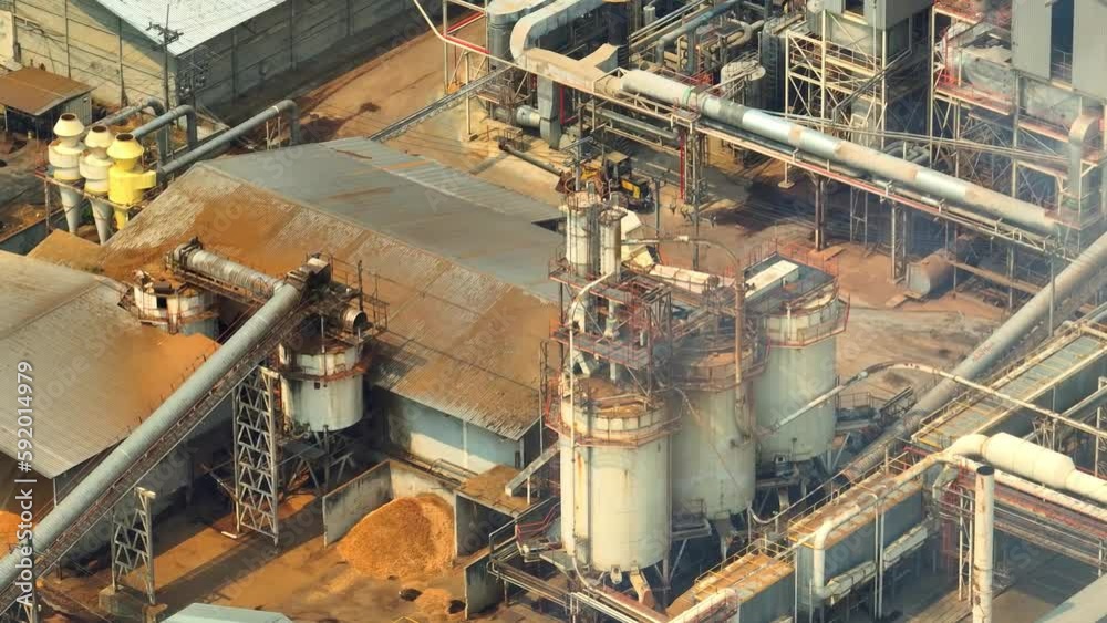 Industrial exhaust fumes appear as plumes of smoke or vapor rising from ...