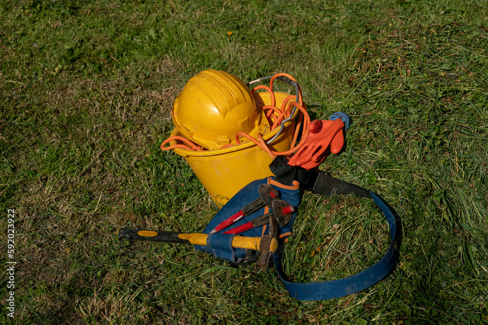 work on construction sites, individual protection of helmet, hammer and ...