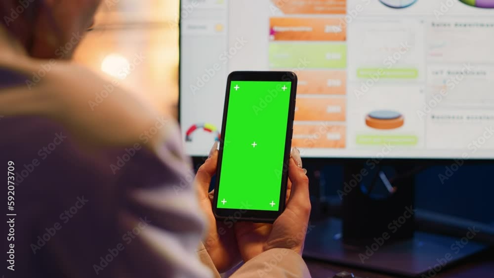 Advisor agent using mobile phone with green screen to work on corporate ...