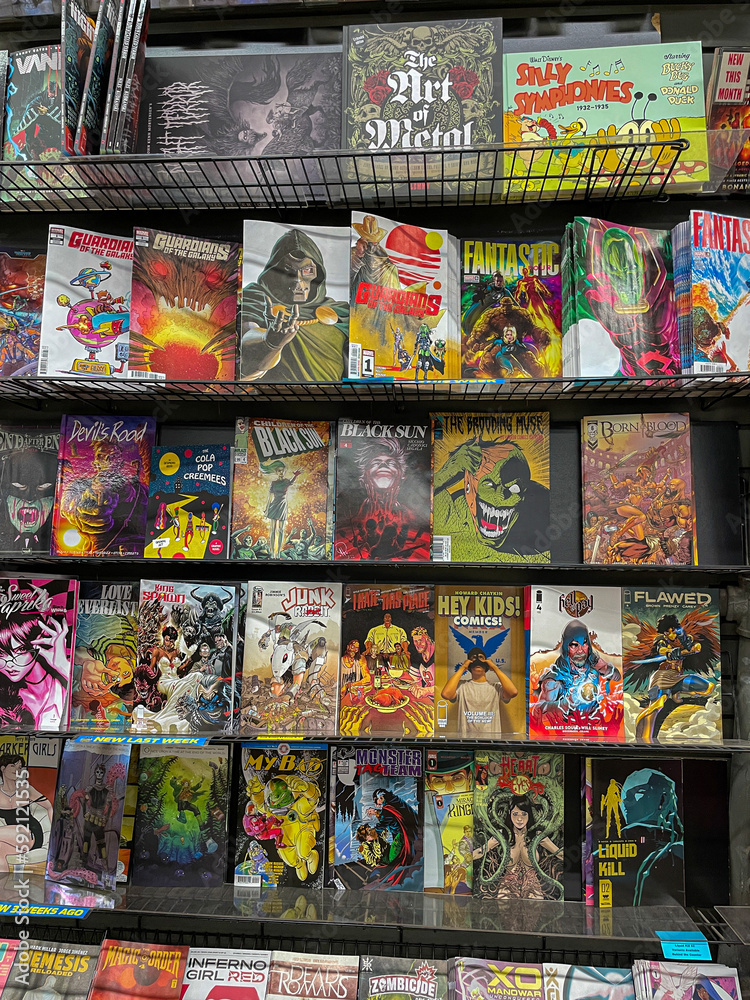 Variety of comic book titles available for sale at Midtown Comics store ...