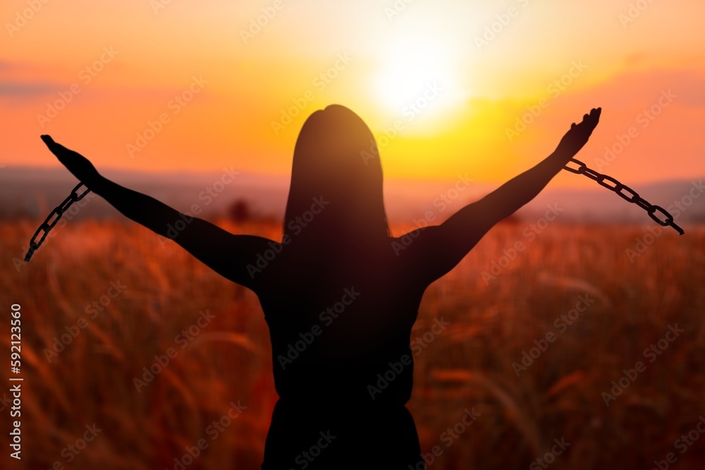 Silhouette of a person with chain Freedom outdoor Stock Photo | Adobe Stock