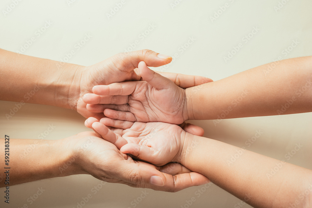 Top view parents and little kid holding empty hands together studio ...