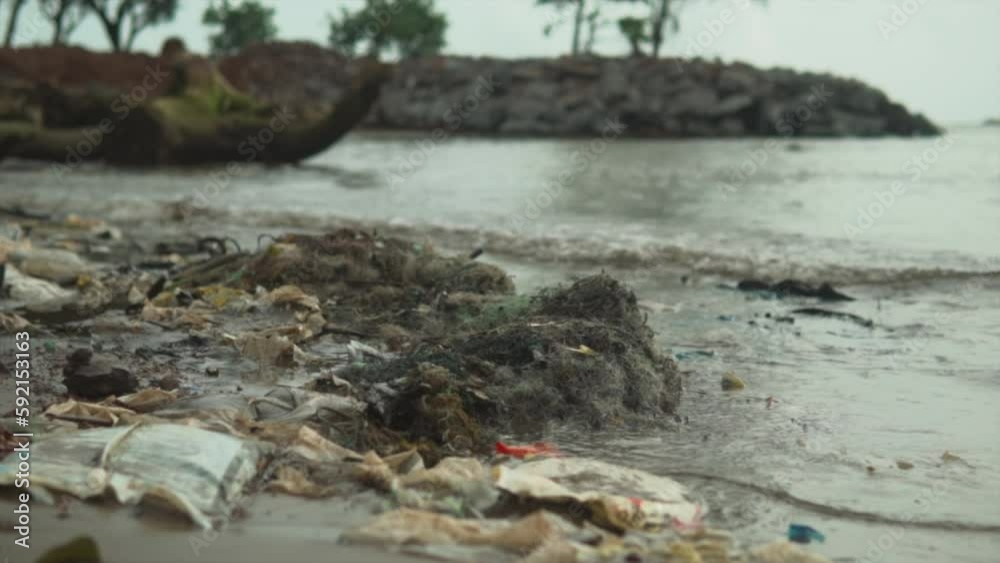fishing net abandoned on Goa beach, highlighting pollution, littering ...