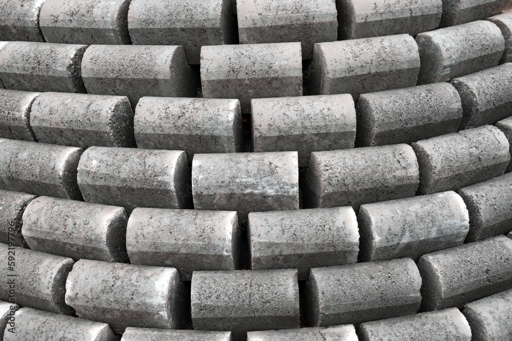 Curved retaining wall made of concrete fragmented blocks Stock Photo ...