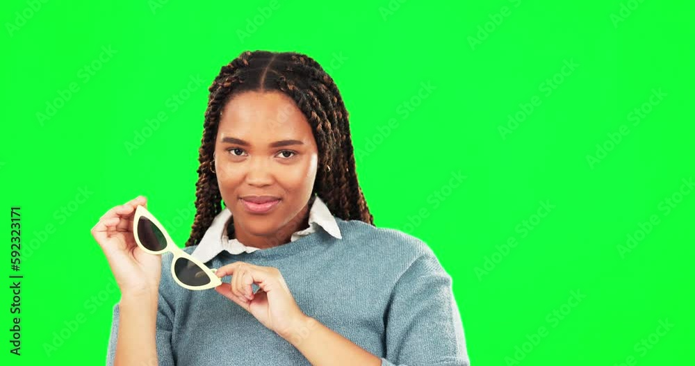 Cool, green screen and woman remove sunglasses feeling happy and ...