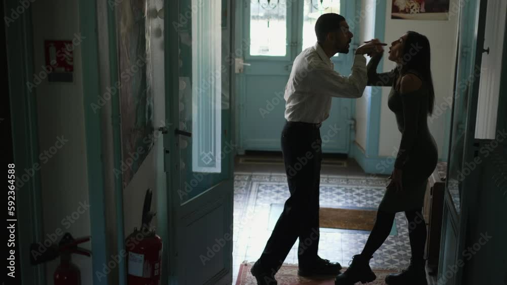 Couple pointing finger at each other blaming the other person for ...