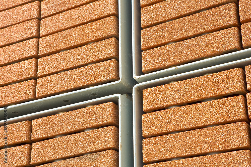 New performing modern exposed brick wall made with blocks with surface ...