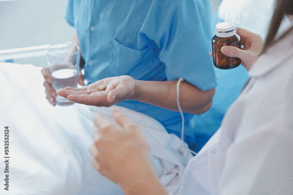 Injured patient showing doctor broken wrist and arm with bandage in ...