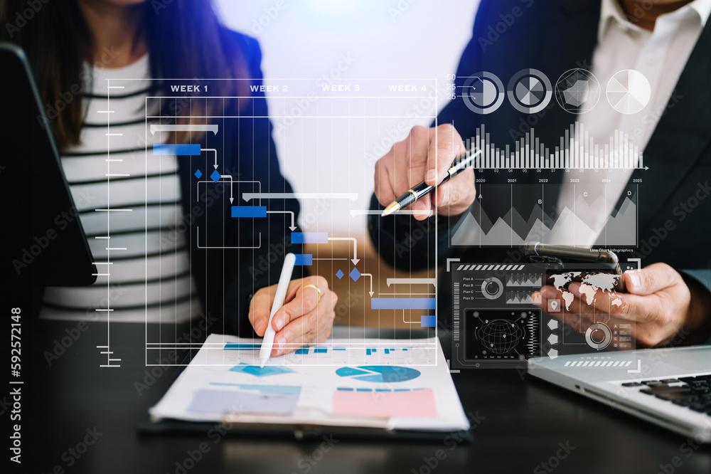 Businessman hand Project manager working and update tasks and Gantt ...