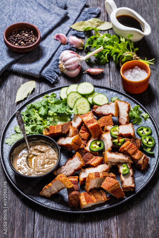 Lechon Kawali, filipino crispy fried pork belly Stock Photo | Adobe Stock