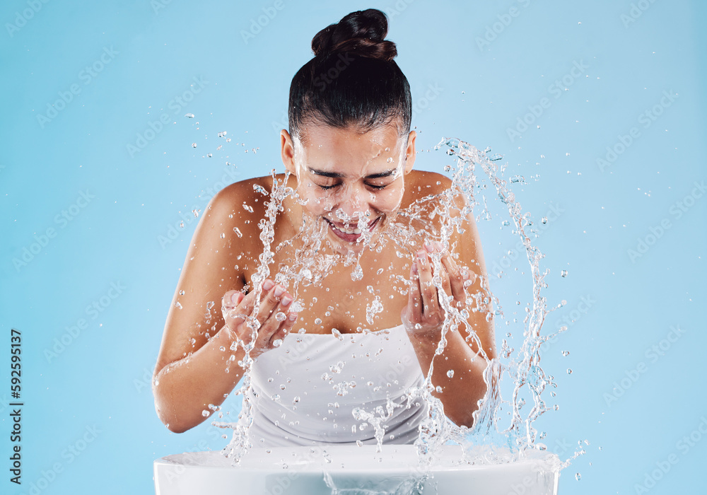Sink, water splash and skincare of a woman washing face for natural ...