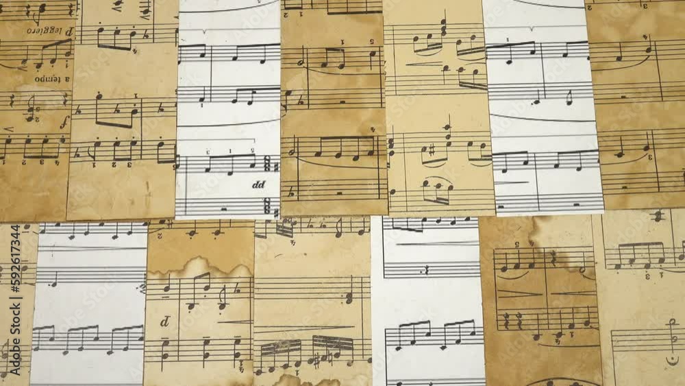 A collage from various old parts of old sheets music on cardboard ...