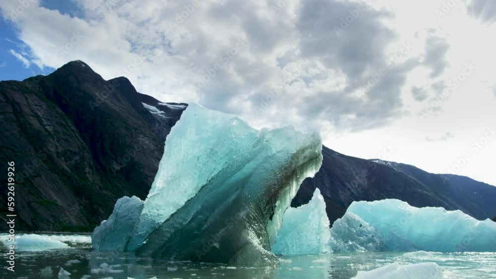 Watch the ice floes and icebergs on the river in a small boat. Rocks ...