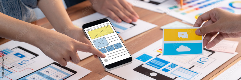 Panorama shot of front-end developer team brainstorming UI and UX ...