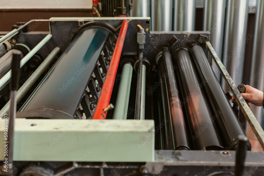 Close-up of a lithographic press or rolling press used for creating ...