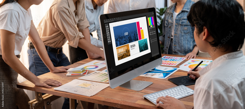 Graphic designer work on computer laptop and with graphic drawing pen ...