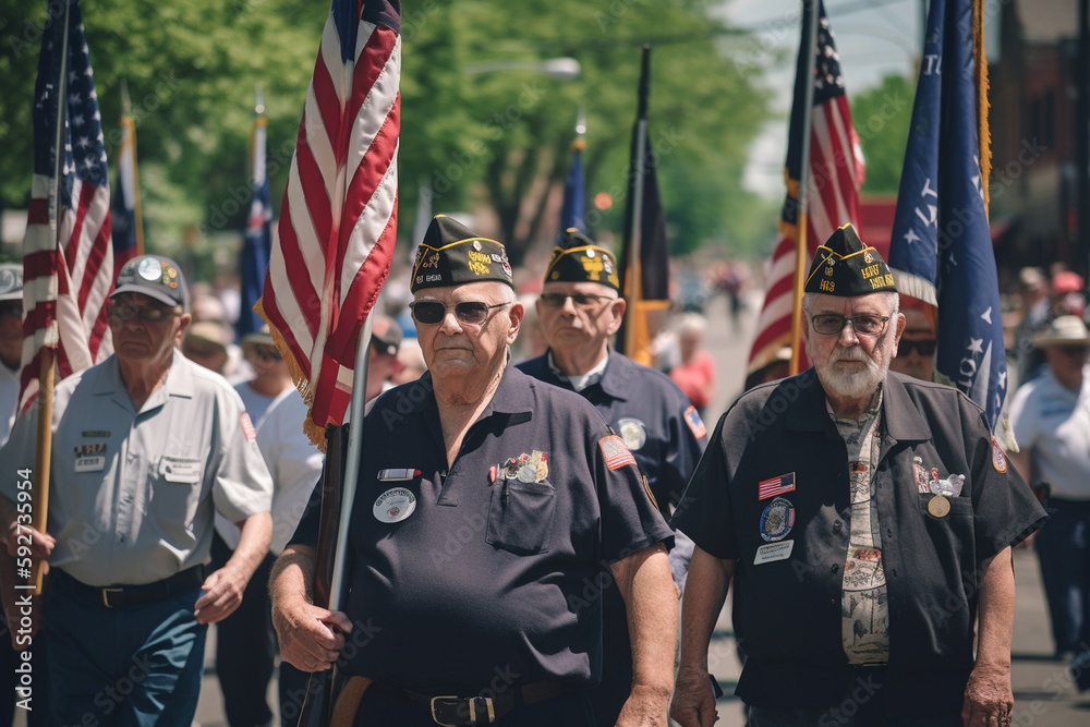 Veterans marching in a Memorial Day parade, carrying banners and flags ...