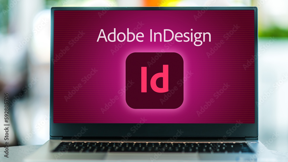Laptop computer displaying logo of Adobe InDesign Stock Photo | Adobe Stock