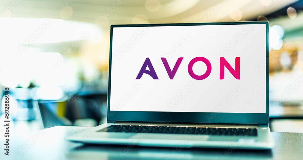 Laptop computer displaying logo of Avon Products Stock Photo | Adobe Stock