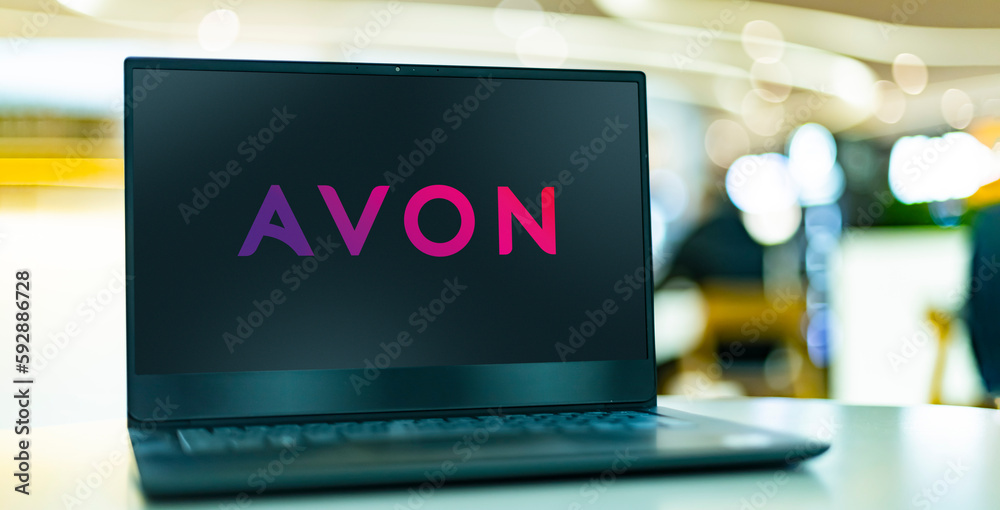 Laptop computer displaying logo of Avon Products Stock Photo | Adobe Stock