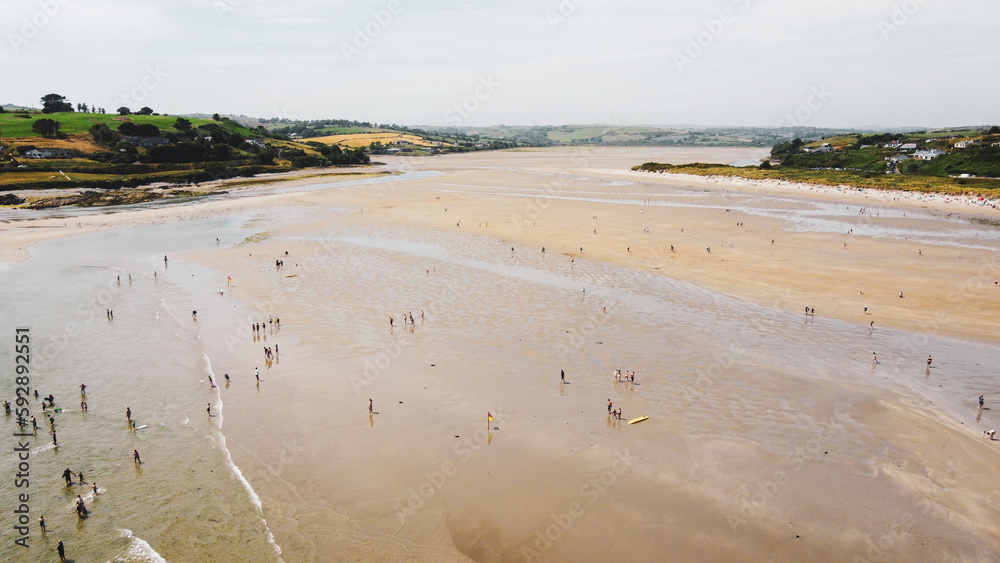 Irish spend their leisure time on the famous sandy beach of Inchydoney ...