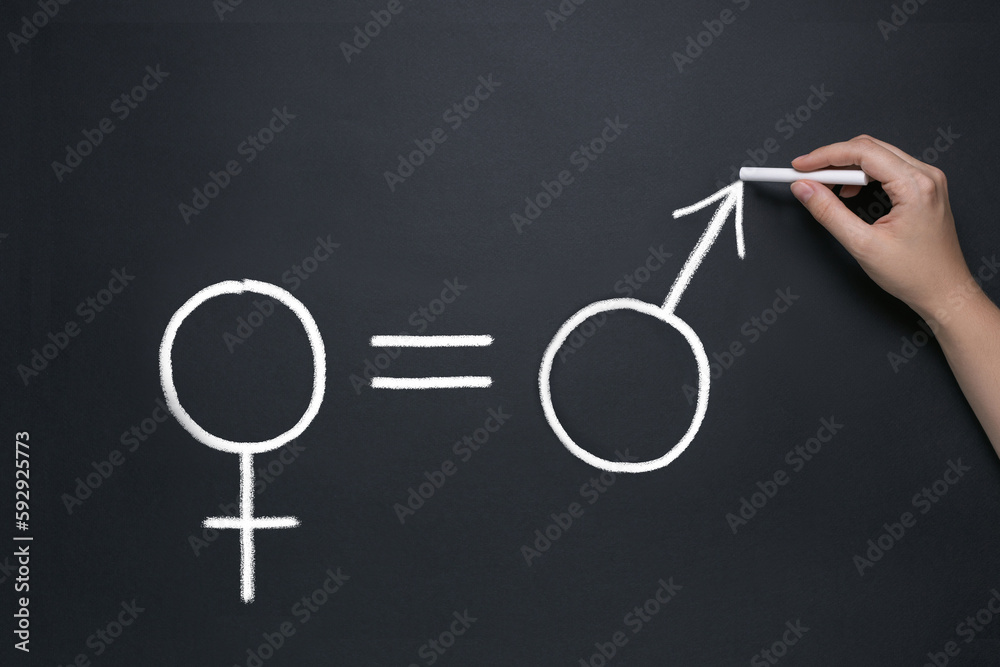gender equality concept, drawing on a school blackboard with chalk ...