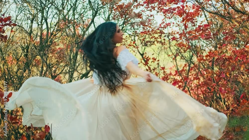 Fantasy happy woman spinning dancing in forest. Lady dancer girl ...