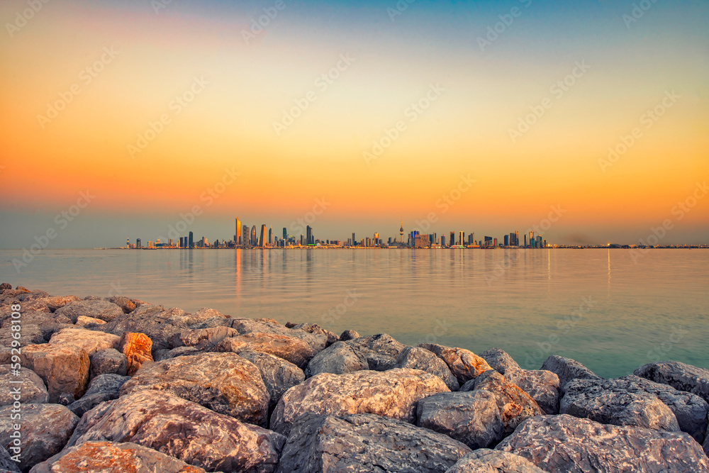 Kuwait Skyline view from beach during the national day celebration ...
