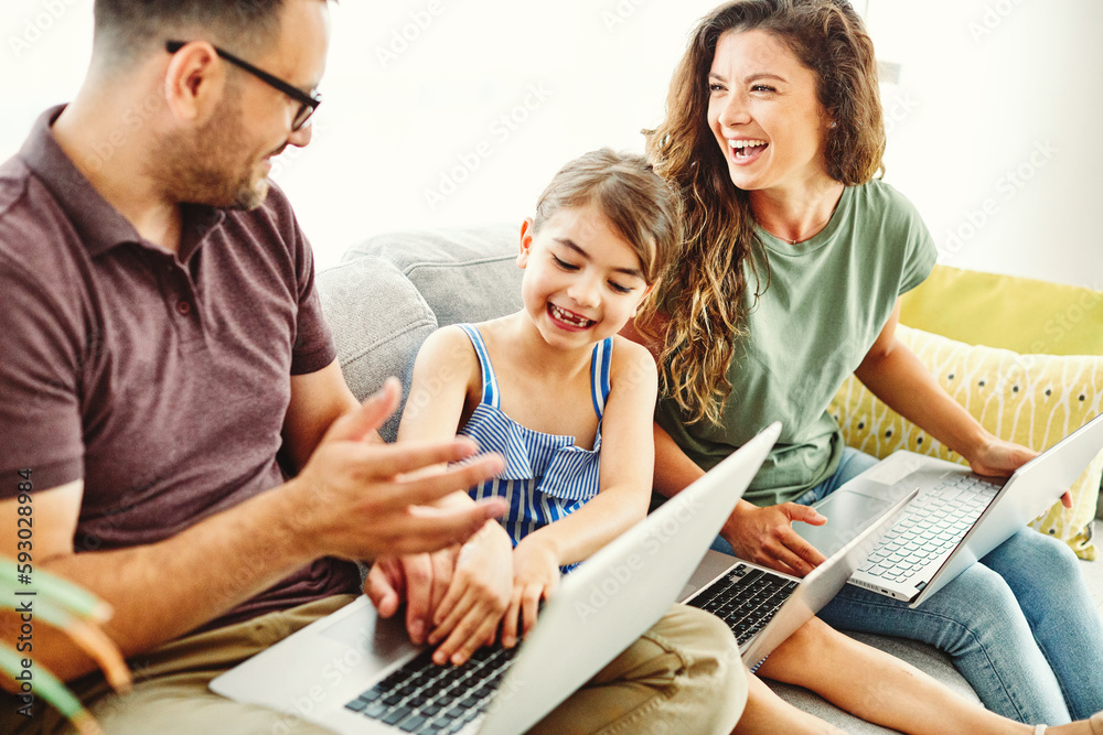 child laptop family computer woman mother father happy home man ...