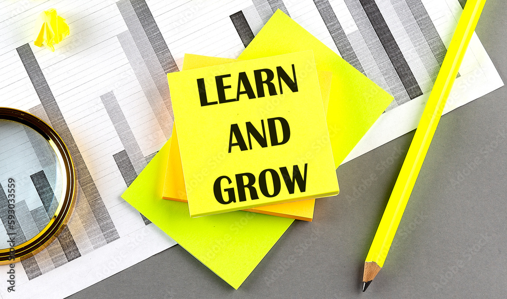 LEARN AND GROW text on sticky on sticky on chart with pen Stock Photo ...
