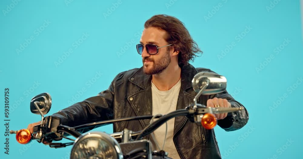 Motorbike, fashion and man riding in studio isolated on blue background ...