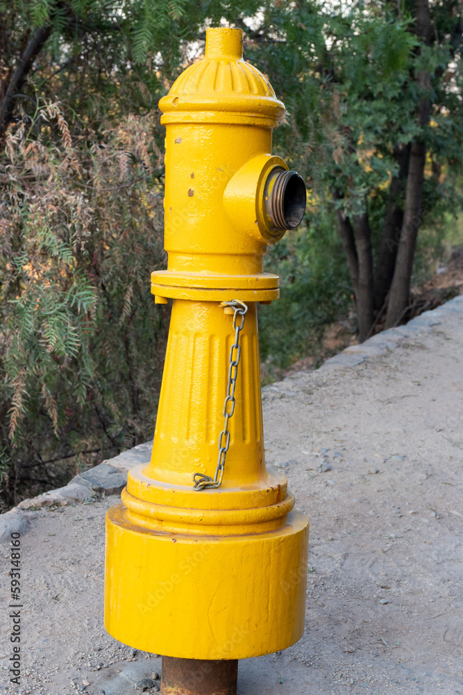 fire hydrant or yellow tap on San Cristobal hill, in Santiago de Chile ...