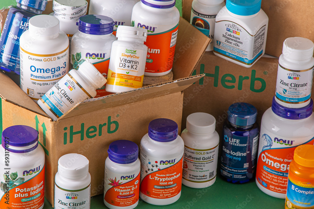 Vitamins, minerals and micronutrients from iHerb box. Lots of different ...