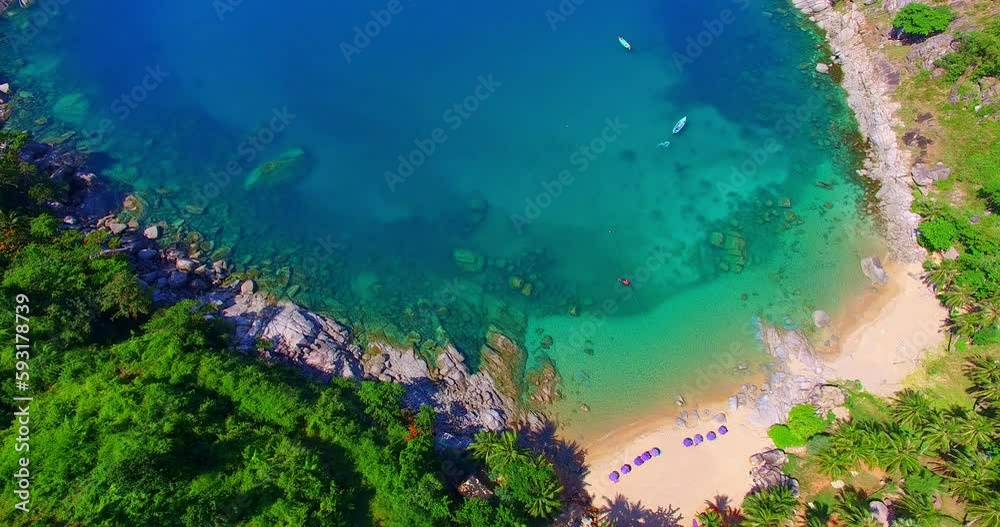 aerial Top view, hidden beach is round shape with smooth white sand ...