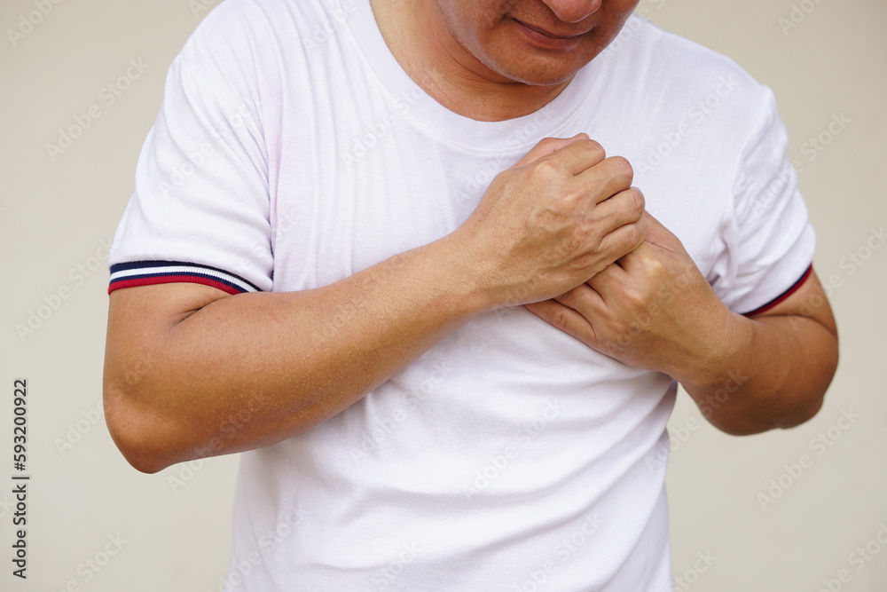 Closeup Asian man feels hurt his chest, suffering from chest pain ...