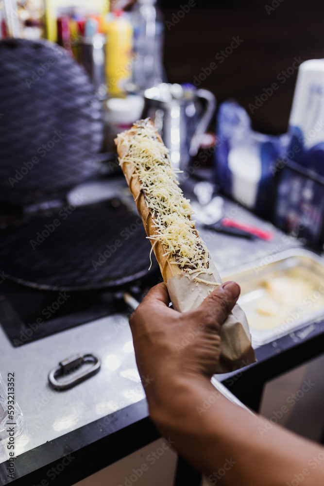 preparing Marquesitas mexican dessert traditional in Yucatan and Cancun ...