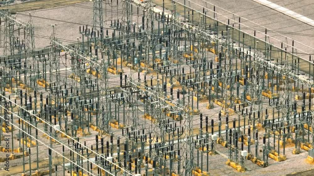 A high voltage power station with various types of electrical equipment ...