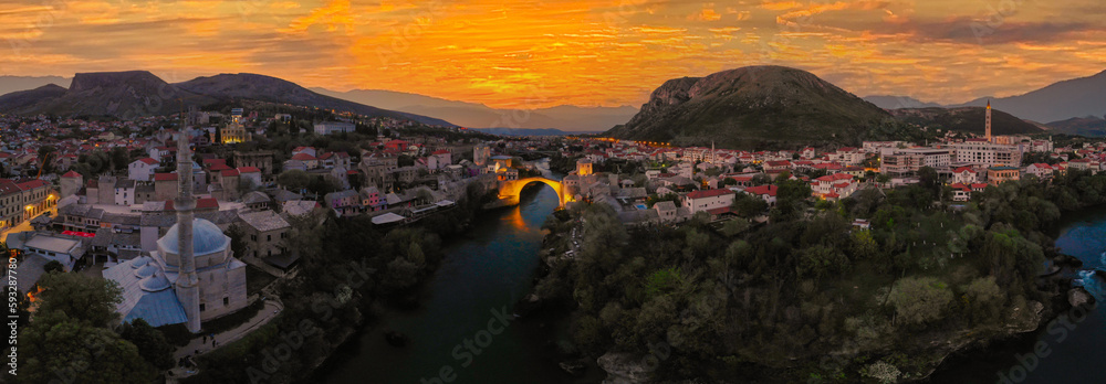 erial Mostar Bridge and Koski Mehmed Pasha Mosque drone view of the ...
