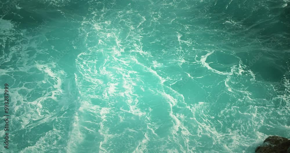 Vidéo Stock Clear ocean water with raging stormy sea waves. Top down of ...