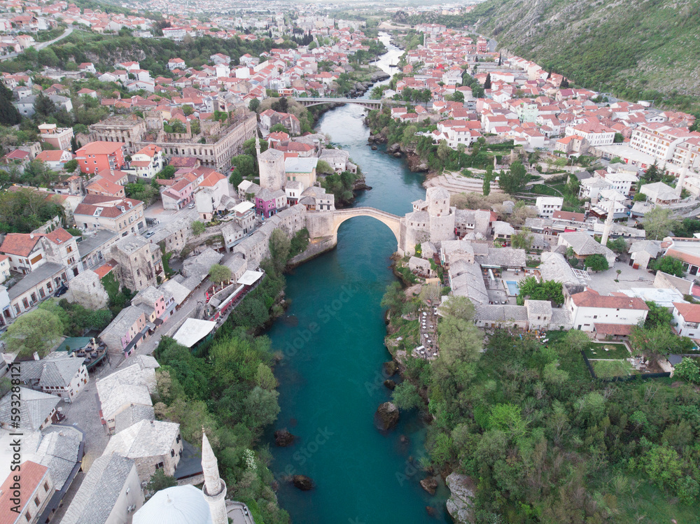 erial Mostar Bridge and Koski Mehmed Pasha Mosque drone view of the ...