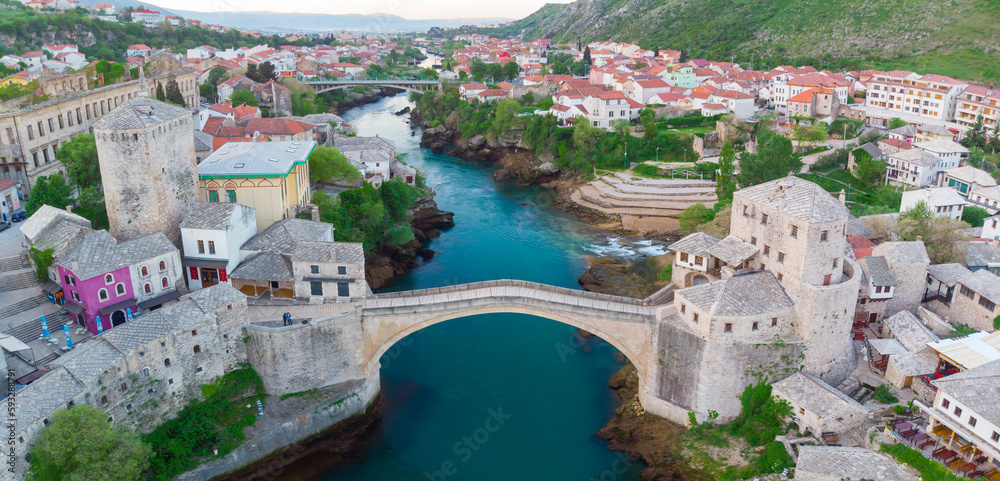 erial Mostar Bridge and Koski Mehmed Pasha Mosque drone view of the ...